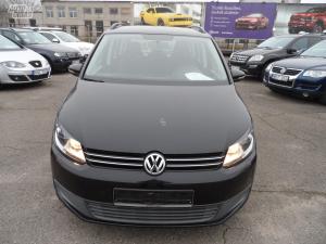 Black Volkswagen Touran 2010 in Klaipeda, with an engine capacity of 1.60 L and mileage of 210 thousand km for 4999 €, photo 2 on AUTOMOTO.COM.LV