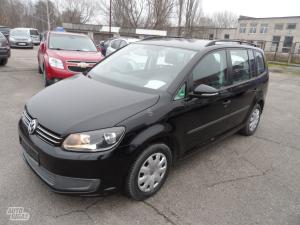 Black Volkswagen Touran 2010 in Klaipeda, with an engine capacity of 1.60 L and mileage of 210 thousand km for 4999 €, photo 3 on AUTOMOTO.COM.LV
