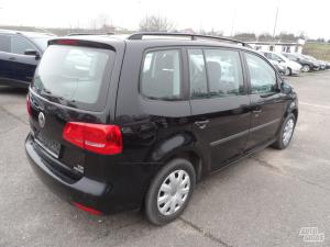 Black Volkswagen Touran 2010 in Klaipeda, with an engine capacity of 1.60 L and mileage of 210 thousand km for 4999 €, photo 7 on AUTOMOTO.COM.LV
