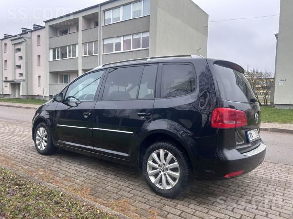 Black Volkswagen Touran 2010 in Riga, with an engine capacity of 2.00 L and mileage of 310 thousand km for 4000 €, photo 5 on AUTOMOTO.COM.LV