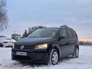 Melns Volkswagen Touran 2010 Tauragė, ar dzinēja tilpumu 1.60 L un nobraukumu 184 tūkst. km par 4800 €, foto  vietnē AUTOMOTO.COM.LV