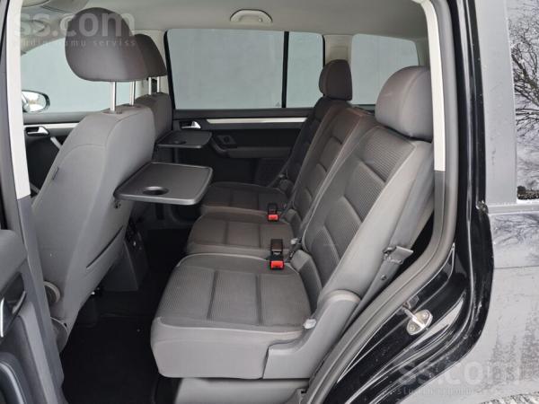 Black Volkswagen Touran 2010 in Ogre, with an engine capacity of 1.90 L and mileage of 233 thousand km for 3999 €, photo 7 on AUTOMOTO.COM.LV