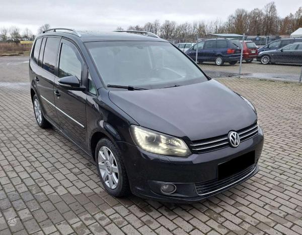 Melns Volkswagen Touran 2010 Marijampole, ar dzinēja tilpumu 1.97 L un nobraukumu 320 tūkst. km par 4999 €, foto 1 vietnē AUTOMOTO.COM.LV