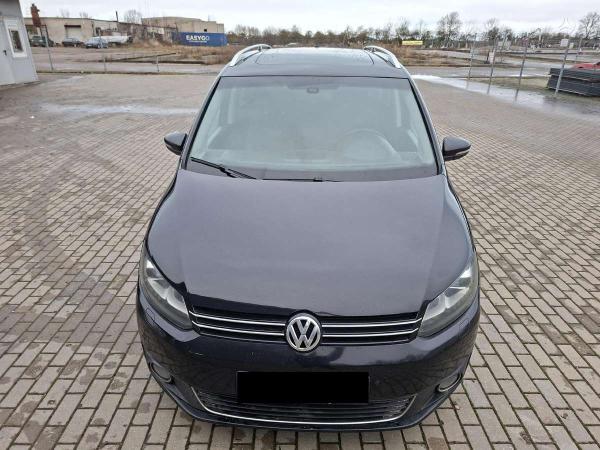 Melns Volkswagen Touran 2010 Marijampole, ar dzinēja tilpumu 1.97 L un nobraukumu 320 tūkst. km par 4999 €, foto 2 vietnē AUTOMOTO.COM.LV