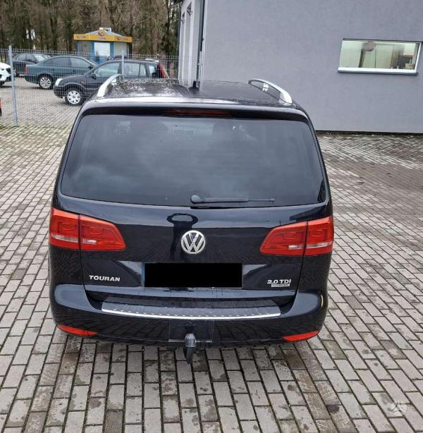 Melns Volkswagen Touran 2010 Marijampole, ar dzinēja tilpumu 1.97 L un nobraukumu 320 tūkst. km par 4999 €, foto 6 vietnē AUTOMOTO.COM.LV