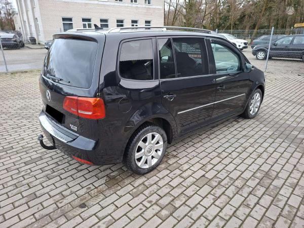 Melns Volkswagen Touran 2010 Marijampole, ar dzinēja tilpumu 1.97 L un nobraukumu 320 tūkst. km par 4999 €, foto 7 vietnē AUTOMOTO.COM.LV