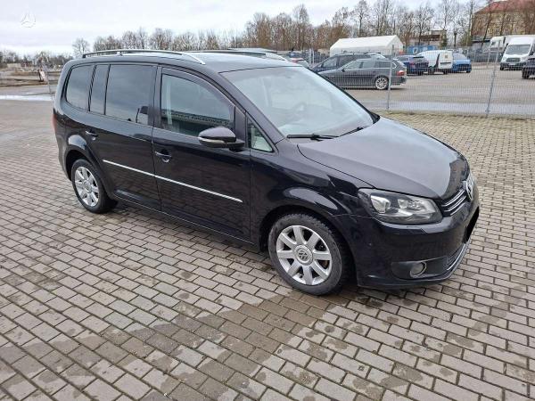 Melns Volkswagen Touran 2010 Marijampole, ar dzinēja tilpumu 1.97 L un nobraukumu 320 tūkst. km par 4999 €, foto 9 vietnē AUTOMOTO.COM.LV