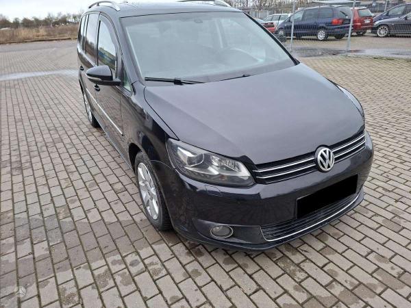 Melns Volkswagen Touran 2010 Marijampole, ar dzinēja tilpumu 1.97 L un nobraukumu 320 tūkst. km par 4999 €, foto 10 vietnē AUTOMOTO.COM.LV