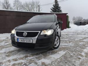 Black Volkswagen Touran 2010 in Kaunas, with an engine capacity of 1.90 L and mileage of 284 thousand km for 3799 €, photo  on AUTOMOTO.COM.LV