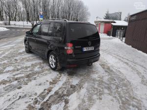 Black Volkswagen Touran 2010 in Kaunas, with an engine capacity of 1.90 L and mileage of 284 thousand km for 3799 €, photo 4 on AUTOMOTO.COM.LV