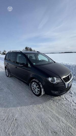 Melns Volkswagen Touran 2010 Biržai, ar dzinēja tilpumu 1.39 L un nobraukumu 215 tūkst. km par 3200 €, foto 5 vietnē AUTOMOTO.COM.LV