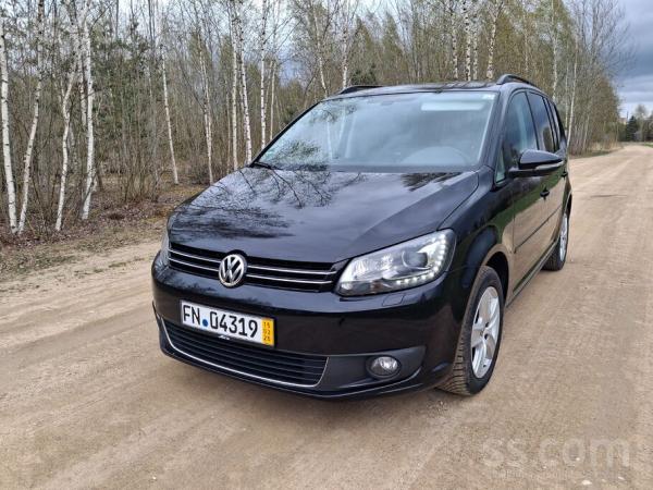 Black Volkswagen Touran 2010 in Preili, with an engine capacity of 2.00 L and mileage of 274 thousand km for 7150 €, photo 1 on AUTOMOTO.COM.LV