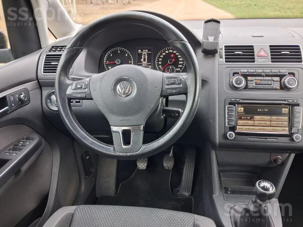 Black Volkswagen Touran 2010 in Preili, with an engine capacity of 2.00 L and mileage of 274 thousand km for 7150 €, photo 6 on AUTOMOTO.COM.LV