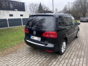 Black Volkswagen Touran 2010 in Riga, with an engine capacity of 2.00 L and mileage of 310 thousand km for 3500 €, photo 5 on AUTOMOTO.COM.LV
