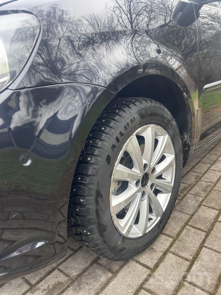 Black Volkswagen Touran 2010 in Riga, with an engine capacity of 2.00 L and mileage of 310 thousand km for 3500 €, photo 8 on AUTOMOTO.COM.LV