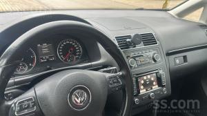 Black Volkswagen Touran 2010 in Riga, with an engine capacity of 2.00 L and mileage of 310 thousand km for 3500 €, photo 11 on AUTOMOTO.COM.LV