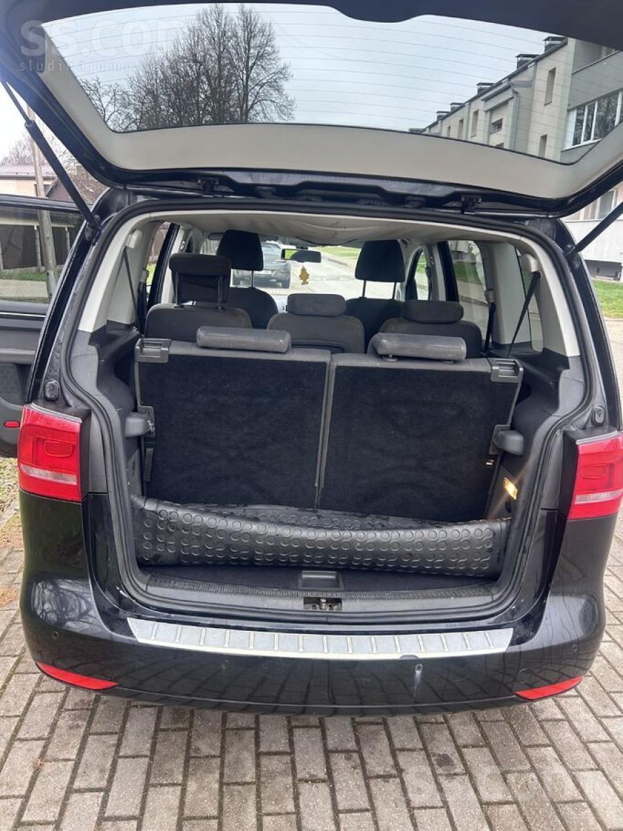Black Volkswagen Touran 2010 in Riga, with an engine capacity of 2.00 L and mileage of 310 thousand km for 3500 €, photo 12 on AUTOMOTO.COM.LV