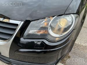 Melns Volkswagen Touran 2010 Daugavpils, ar dzinēja tilpumu 1.90 L un nobraukumu 0 tūkst. km par 4950 €, foto 20 vietnē AUTOMOTO.COM.LV