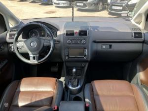 Black Volkswagen Touran 2010 in Taurage, with an engine capacity of 1.39 L and mileage of 220 thousand km for 5000 €, photo 24 on AUTOMOTO.COM.LV