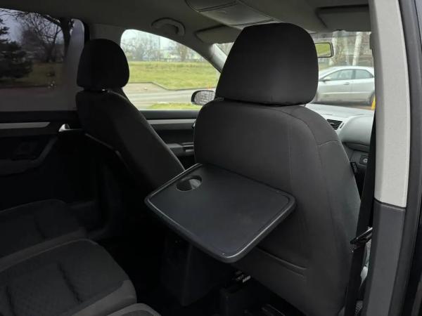 Black Volkswagen Touran 2010 in Riga, with an engine capacity of 2.00 L and mileage of 295 thousand km for 2790 €, photo 9 on AUTOMOTO.COM.LV