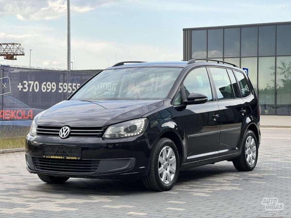 Black Volkswagen Touran 2010 in Siauliai, with an engine capacity of 1.60 L and mileage of 254 thousand km for 6100 €, photo 1 on AUTOMOTO.COM.LV
