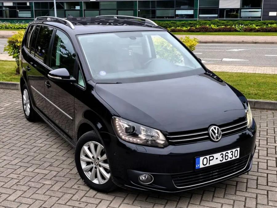 Melns Volkswagen Touran 2010 Jelgava, ar dzinēja tilpumu 1.40 L un nobraukumu 221 tūkst. km par 6990 €, foto 1 vietnē AUTOMOTO.COM.LV