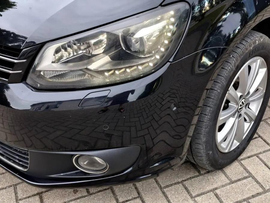 Melns Volkswagen Touran 2010 Jelgava, ar dzinēja tilpumu 1.40 L un nobraukumu 221 tūkst. km par 6990 €, foto 7 vietnē AUTOMOTO.COM.LV