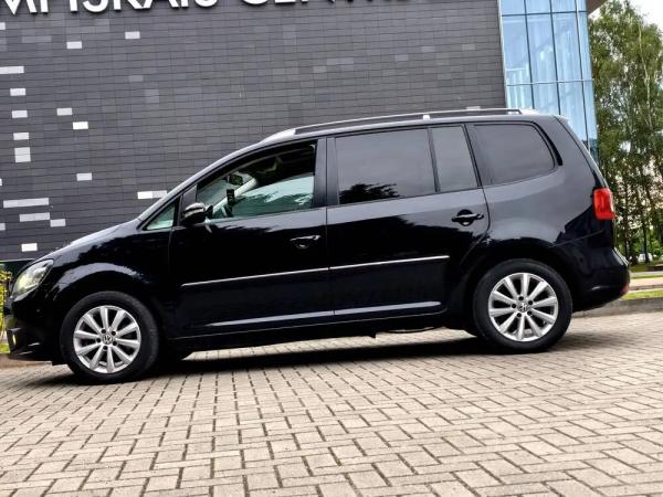 Melns Volkswagen Touran 2010 Jelgava, ar dzinēja tilpumu 1.40 L un nobraukumu 221 tūkst. km par 6990 €, foto 8 vietnē AUTOMOTO.COM.LV