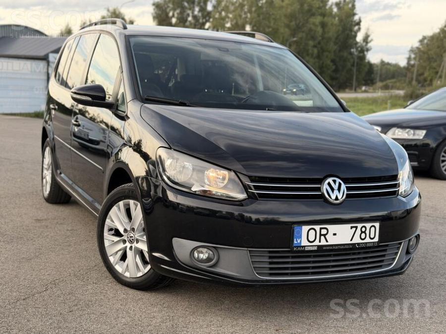 Melns Volkswagen Touran 2010 Ogre, ar dzinēja tilpumu 2.00 L un nobraukumu 192 tūkst. km par 7200 €, foto 1 vietnē AUTOMOTO.COM.LV