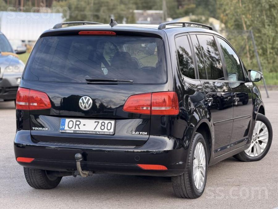 Melns Volkswagen Touran 2010 Ogre, ar dzinēja tilpumu 2.00 L un nobraukumu 192 tūkst. km par 7200 €, foto 11 vietnē AUTOMOTO.COM.LV