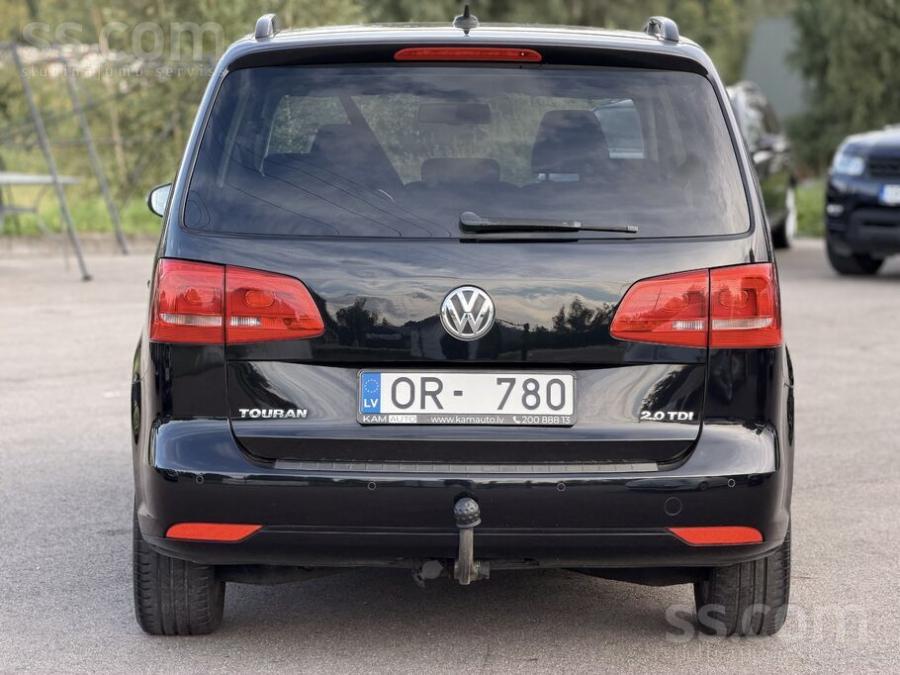 Melns Volkswagen Touran 2010 Ogre, ar dzinēja tilpumu 2.00 L un nobraukumu 192 tūkst. km par 7200 €, foto 12 vietnē AUTOMOTO.COM.LV