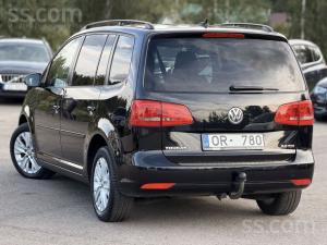 Melns Volkswagen Touran 2010 Ogre, ar dzinēja tilpumu 2.00 L un nobraukumu 192 tūkst. km par 7200 €, foto 13 vietnē AUTOMOTO.COM.LV