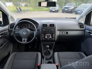 Melns Volkswagen Touran 2010 Ogre, ar dzinēja tilpumu 2.00 L un nobraukumu 192 tūkst. km par 7200 €, foto 14 vietnē AUTOMOTO.COM.LV