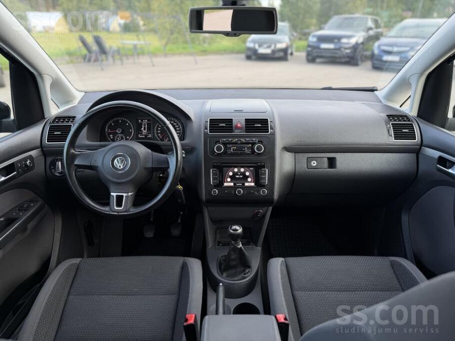 Melns Volkswagen Touran 2010 Ogre, ar dzinēja tilpumu 2.00 L un nobraukumu 192 tūkst. km par 7200 €, foto 14 vietnē AUTOMOTO.COM.LV