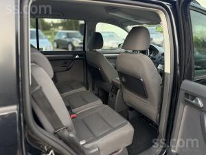 Melns Volkswagen Touran 2010 Ogre, ar dzinēja tilpumu 2.00 L un nobraukumu 192 tūkst. km par 7200 €, foto 20 vietnē AUTOMOTO.COM.LV