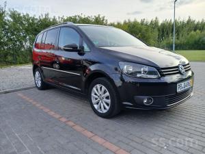 Black Volkswagen Touran 2010 in Saldus, with an engine capacity of 2.00 L and mileage of 275 thousand km for 5400 €, photo 1 on AUTOMOTO.COM.LV