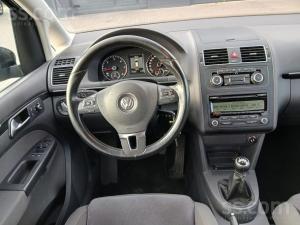 Black Volkswagen Touran 2010 in Saldus, with an engine capacity of 2.00 L and mileage of 275 thousand km for 5400 €, photo 14 on AUTOMOTO.COM.LV