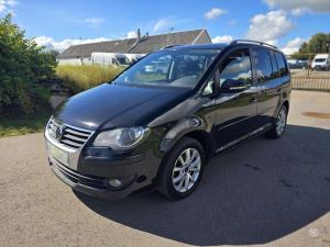 Black Volkswagen Touran 2010 in Taurage, with an engine capacity of 1.60 L and mileage of 288 thousand km for 3500 €, photo  on AUTOMOTO.COM.LV