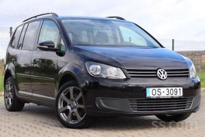 Black Volkswagen Touran 2010 in Riga, with an engine capacity of 1.40 L and mileage of 198 thousand km for 4550 €, photo  on AUTOMOTO.COM.LV