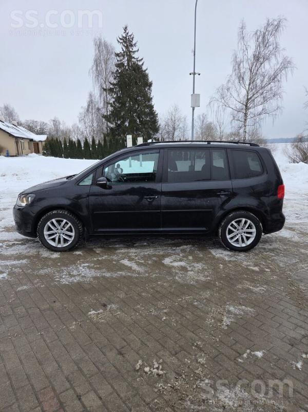 Melns Volkswagen Touran 2011 Ogre, ar dzinēja tilpumu 1.60 L un nobraukumu 209 tūkst. km par 5800 €, foto 4 vietnē AUTOMOTO.COM.LV