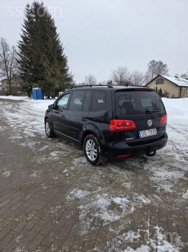 Melns Volkswagen Touran 2011 Ogre, ar dzinēja tilpumu 1.60 L un nobraukumu 209 tūkst. km par 5800 €, foto 5 vietnē AUTOMOTO.COM.LV