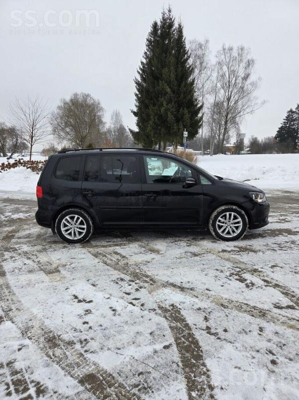 Melns Volkswagen Touran 2011 Ogre, ar dzinēja tilpumu 1.60 L un nobraukumu 209 tūkst. km par 5800 €, foto 8 vietnē AUTOMOTO.COM.LV