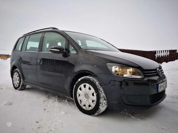 Black Volkswagen Touran 2011 in Klaipeda, with an engine capacity of 1.60 L and mileage of 244 thousand km for 4999 €, photo 2 on AUTOMOTO.COM.LV
