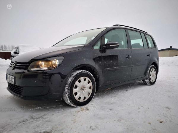Black Volkswagen Touran 2011 in Klaipeda, with an engine capacity of 1.60 L and mileage of 244 thousand km for 4999 €, photo 3 on AUTOMOTO.COM.LV