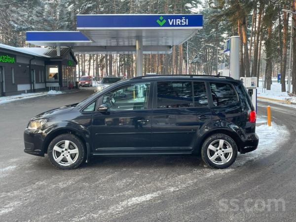 Melns Volkswagen Touran 2011 Rīga, ar dzinēja tilpumu 1.40 L un nobraukumu 0 tūkst. km par 6499 €, foto 2 vietnē AUTOMOTO.COM.LV