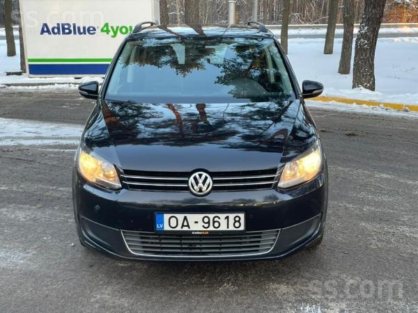 Melns Volkswagen Touran 2011 Rīga, ar dzinēja tilpumu 1.40 L un nobraukumu 0 tūkst. km par 6499 €, foto 8 vietnē AUTOMOTO.COM.LV
