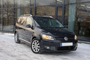 Black Volkswagen Touran 2011 in Klaipeda, with an engine capacity of 2.00 L and mileage of 300 thousand km for 4999 €, photo 2 on AUTOMOTO.COM.LV