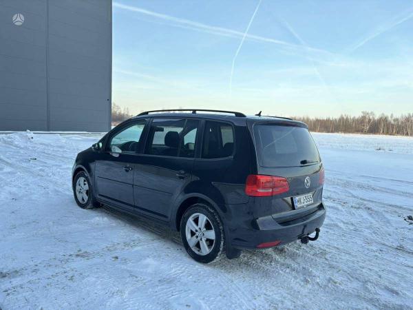 Black Volkswagen Touran 2011 in Siauliai, with an engine capacity of 1.39 L and mileage of 283 thousand km for 4800 €, photo 5 on AUTOMOTO.COM.LV