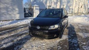 Black Volkswagen Touran 2011 in Kaunas, with an engine capacity of 1.20 L and mileage of 257 thousand km for 4995 €, photo  on AUTOMOTO.COM.LV