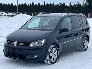 Black Volkswagen Touran 2011 in Kedainiai, with an engine capacity of 1.97 L and mileage of 255 thousand km for 6499 €, photo  on AUTOMOTO.COM.LV